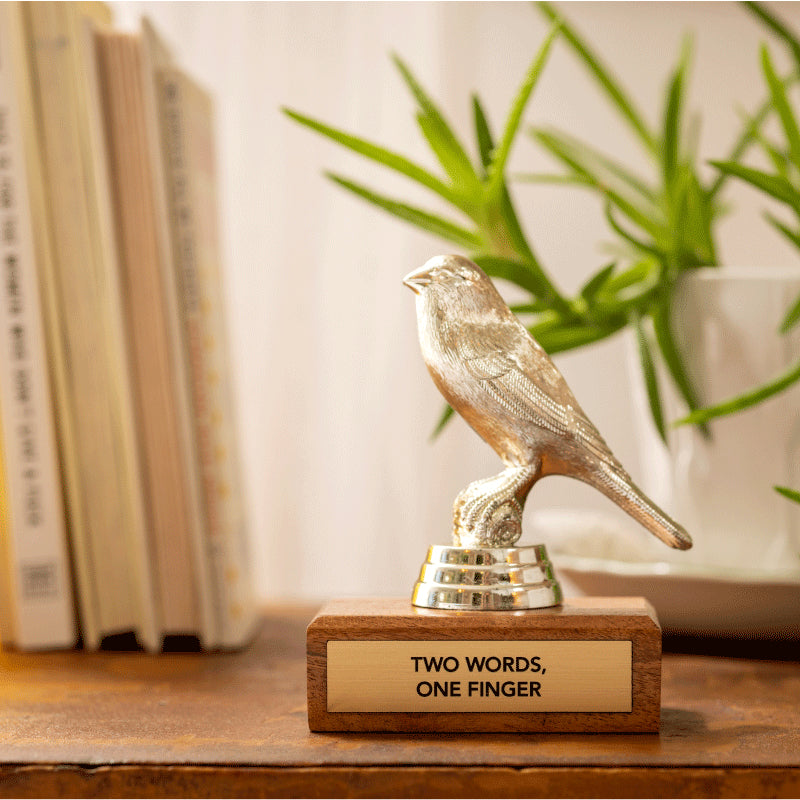 TWO WORDS, ONE FINGER trophy – Jenni Earle